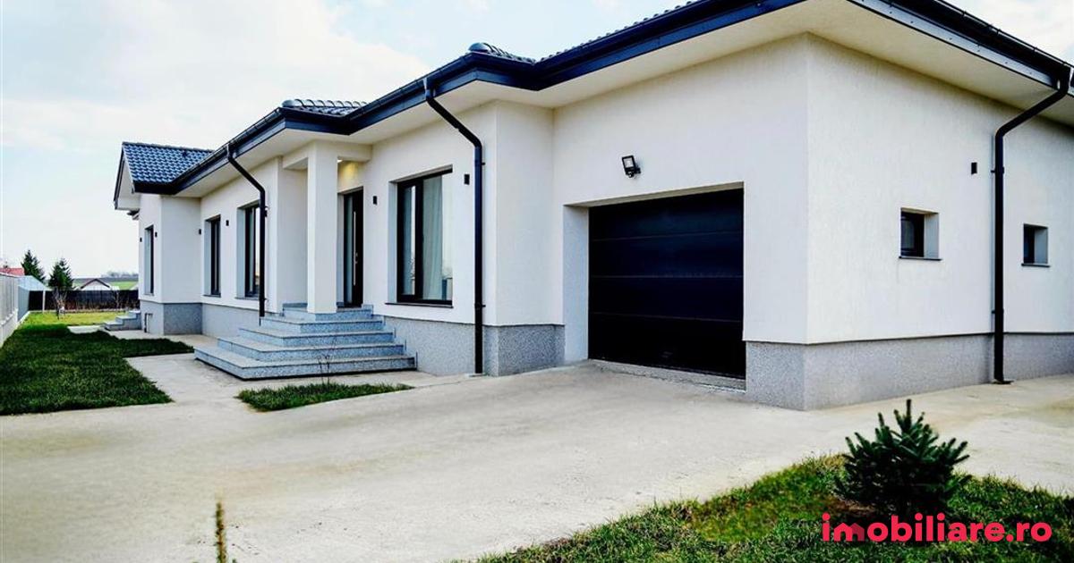 Casa intr-o zona linistita cu garaj si teren-1091 mp | Imobiliare.ro